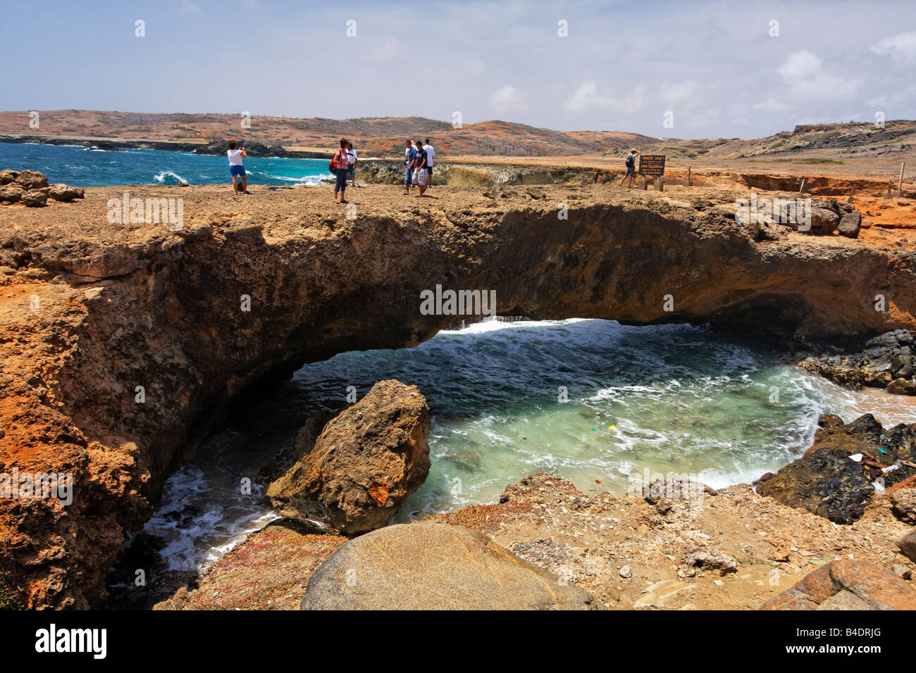 West Indies Aruba Natural Bridge Tourists Stock Photo - Alamy