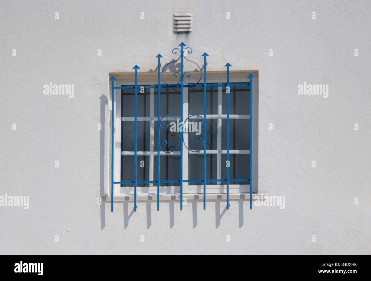 Window in blue Stock Photo - Alamy