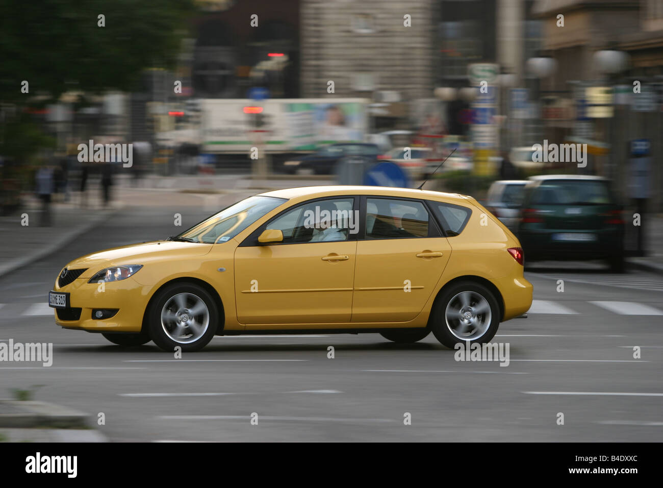 Mazda yellow hi-res stock photography and images - Alamy