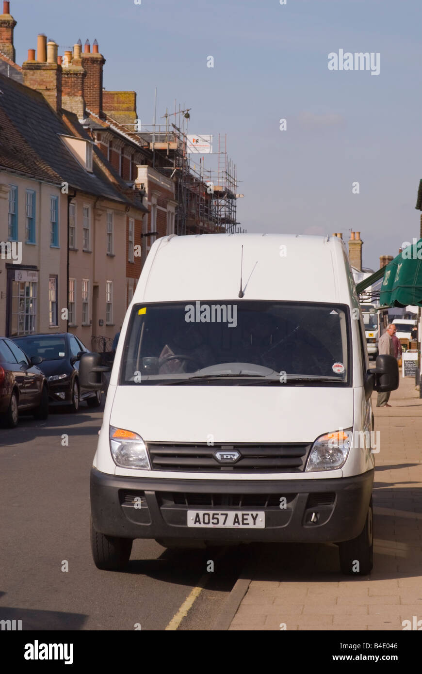 White delivery vans parked hi-res stock photography and images - Alamy