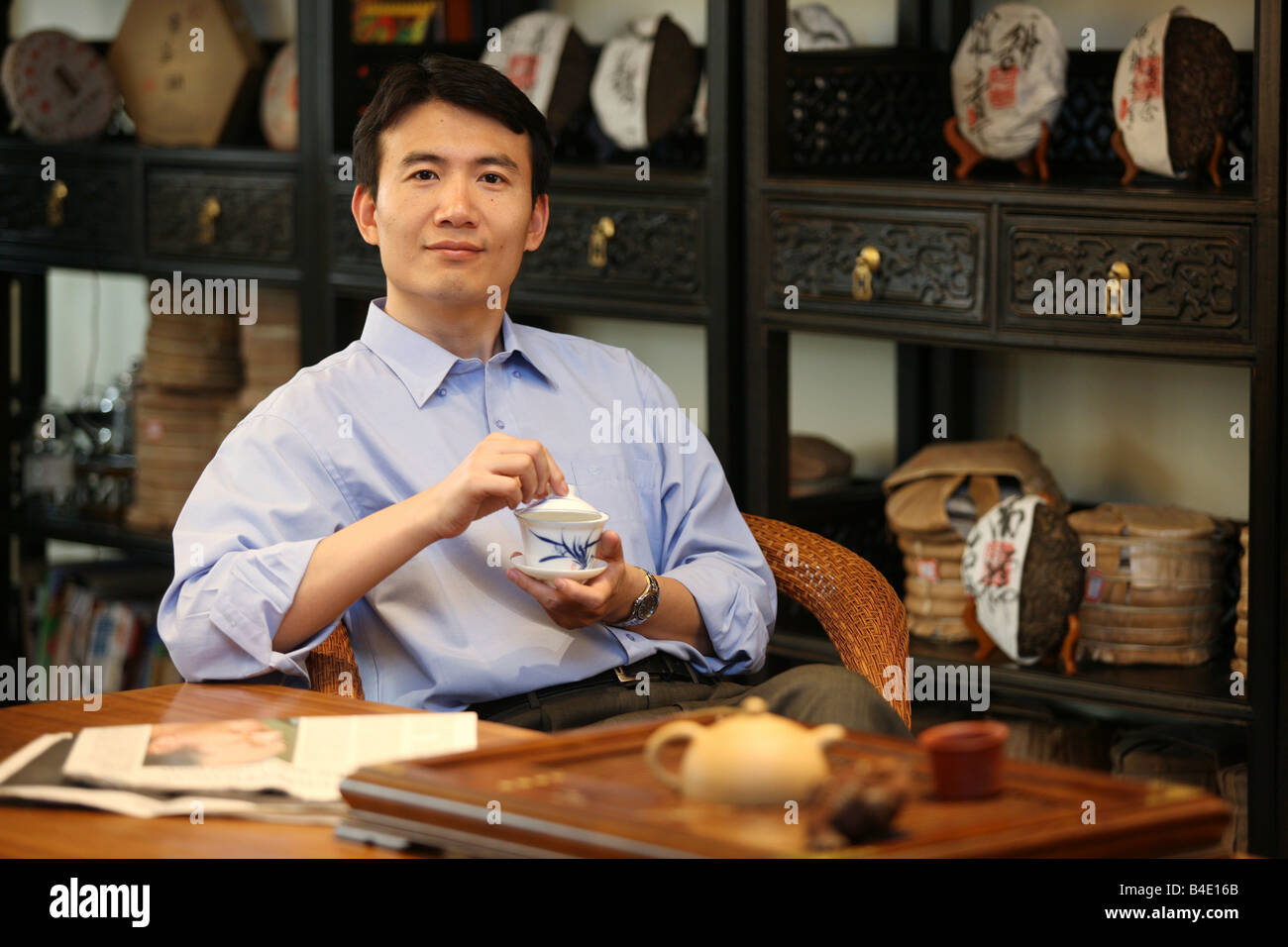 Chinese Man Drinking Tea Stock Photo - Alamy