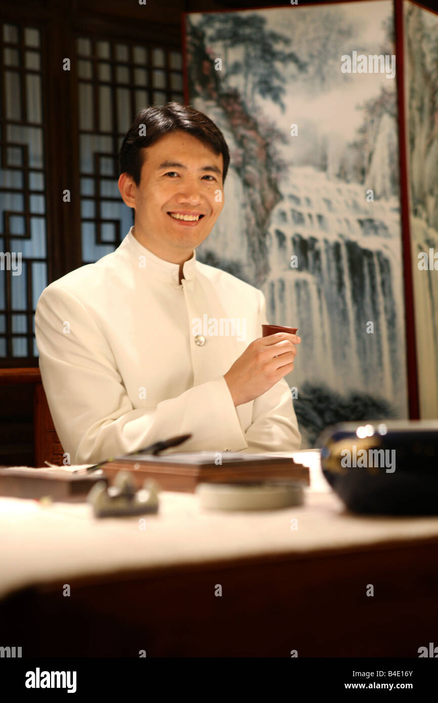 Chinese Man Drinking Tea Stock Photo - Alamy