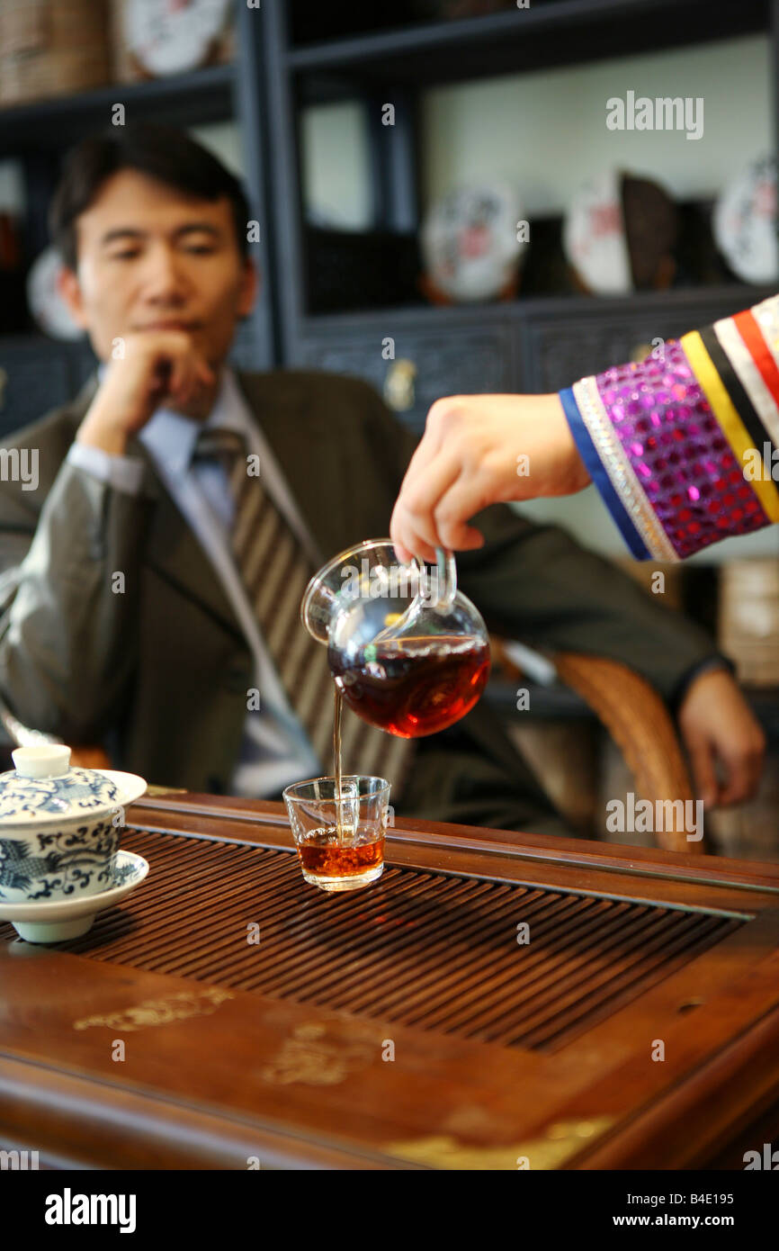 Chinese Man Drinking Tea Stock Photo - Alamy