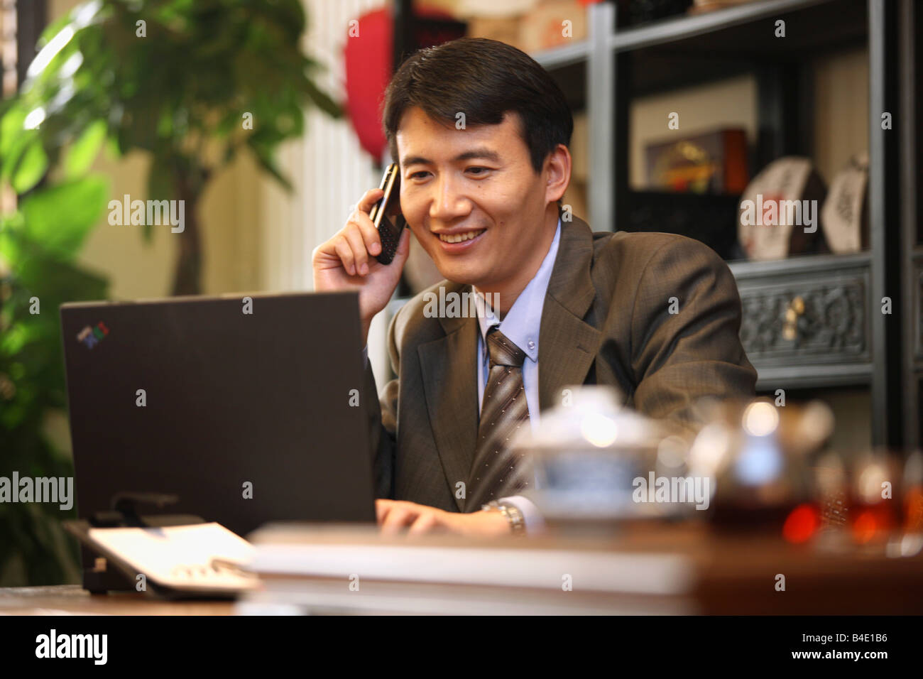 Chinese Business Man Calling Stock Photo - Alamy