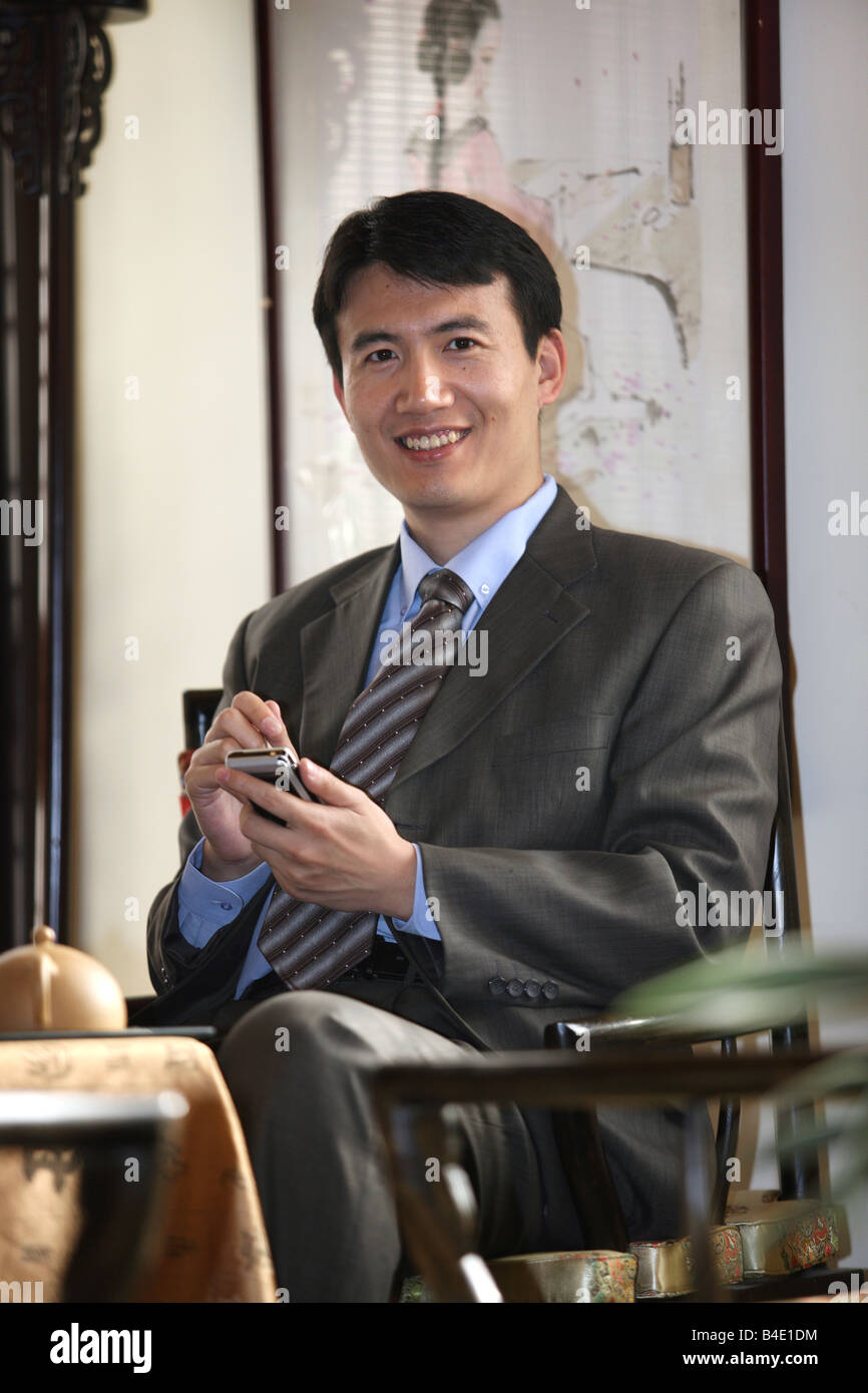 Chinese Business Man Calling Stock Photo - Alamy