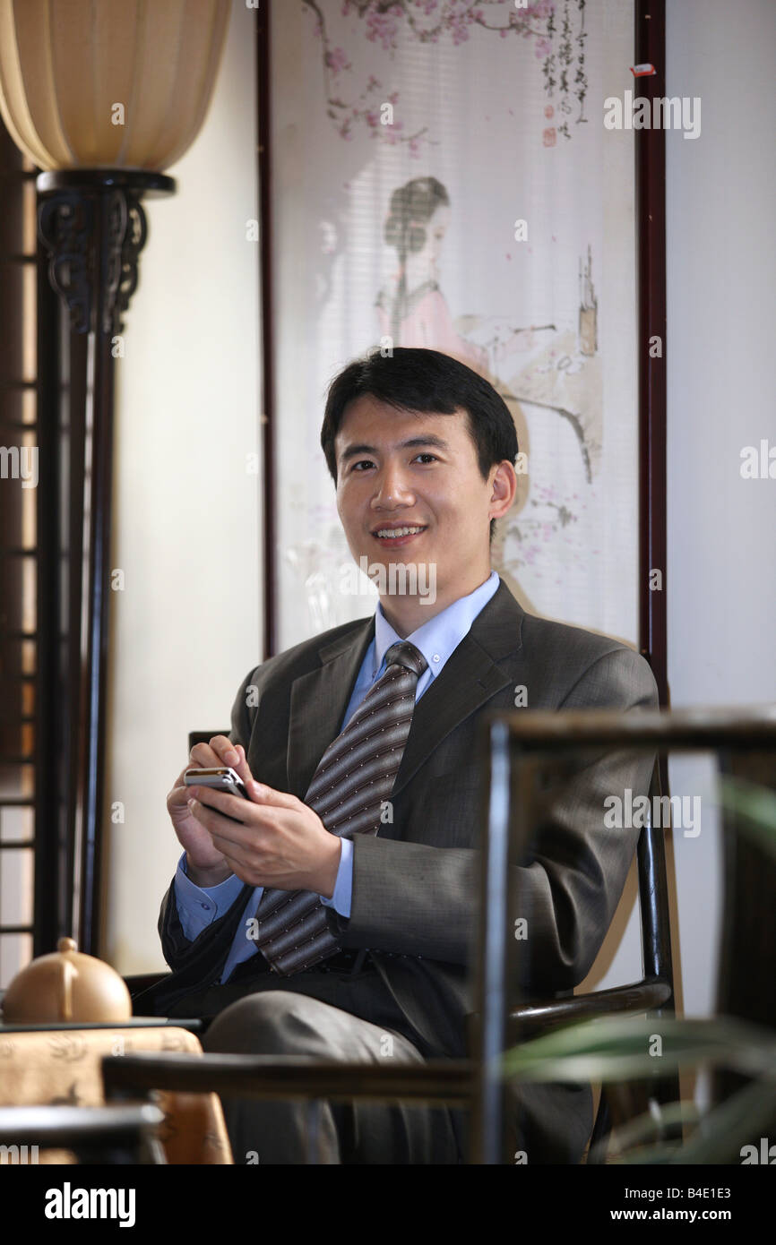 Chinese Business Man Calling Stock Photo - Alamy