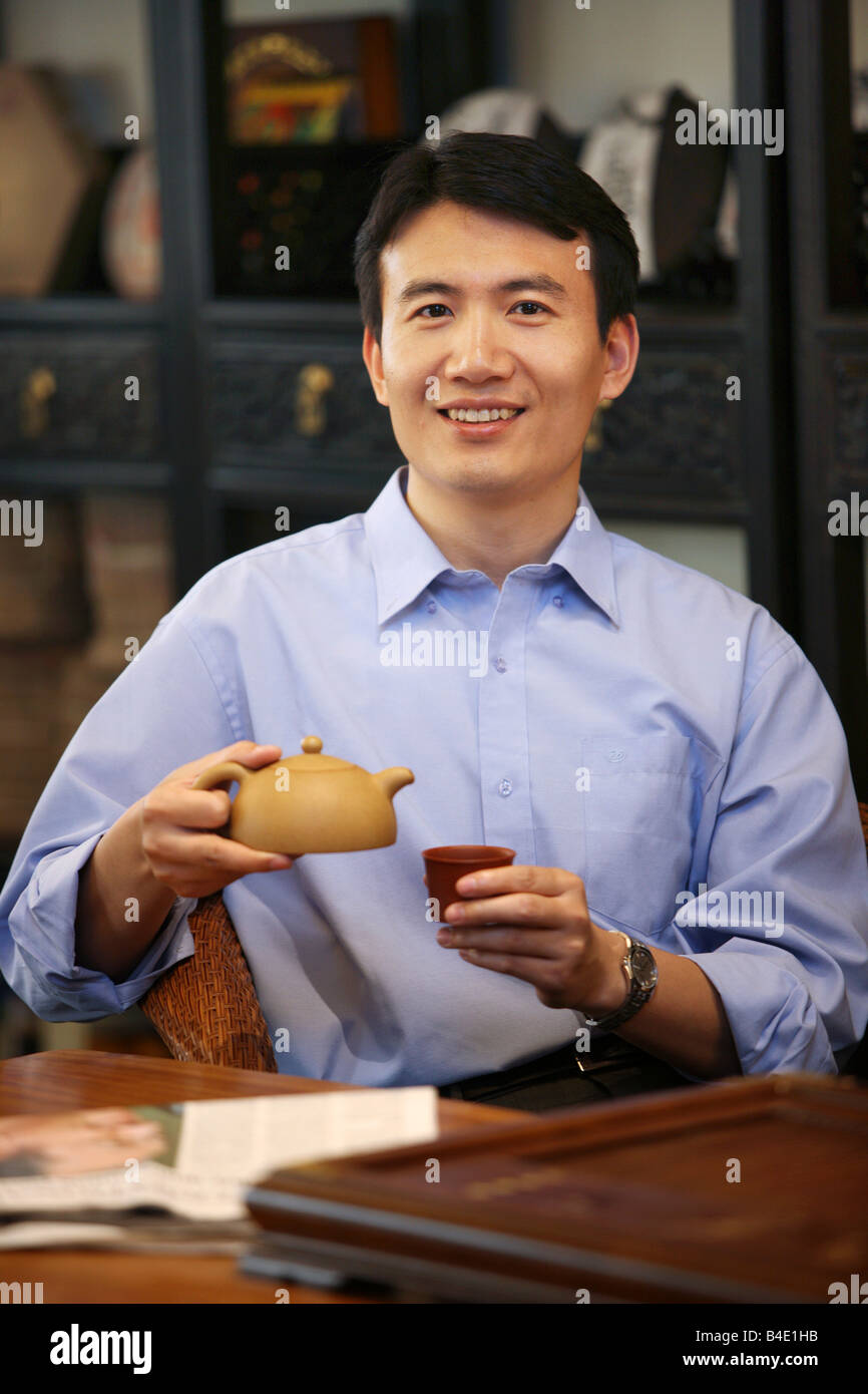 Chinese Man Drinking Tea Stock Photo - Alamy