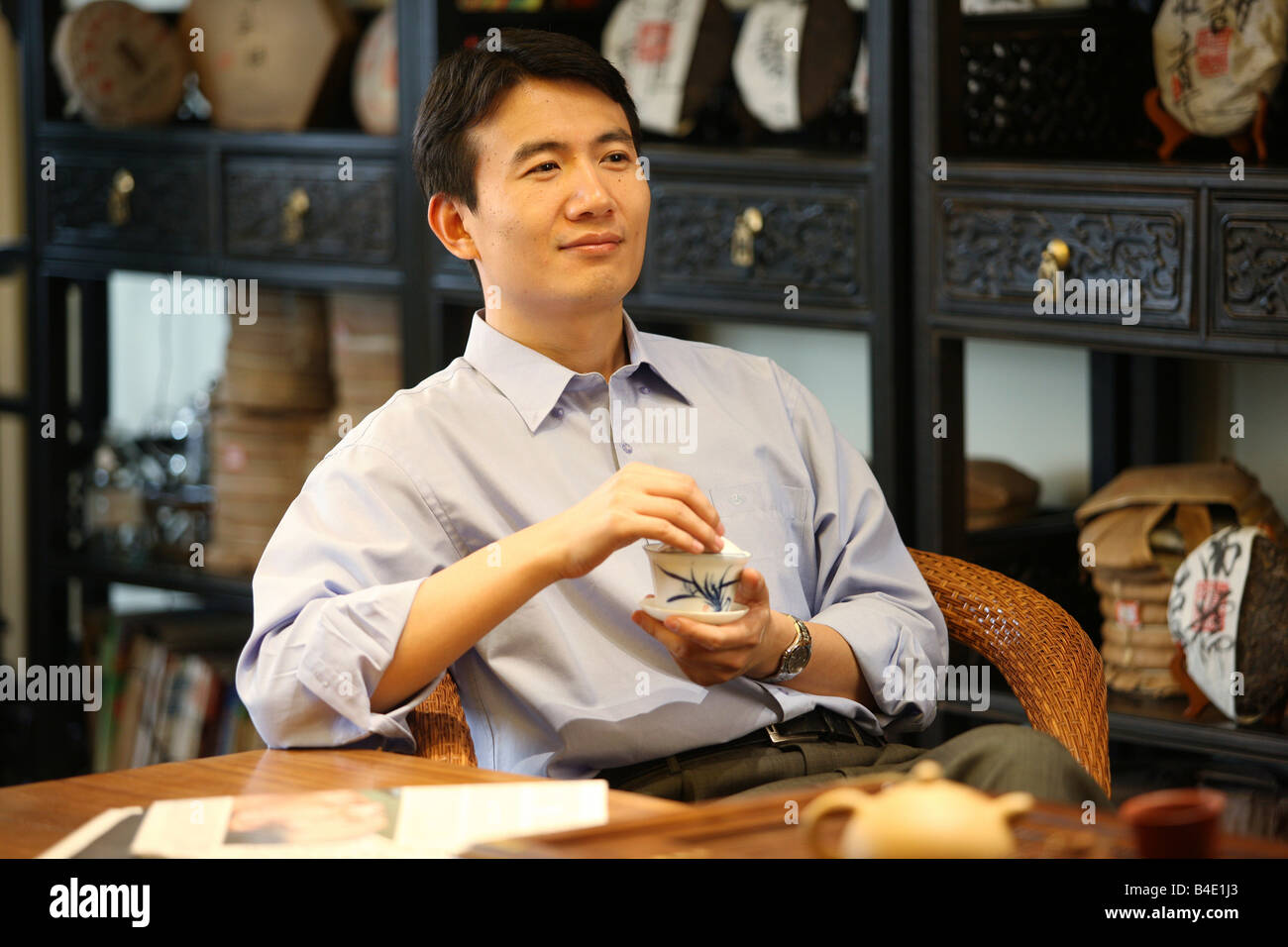 Chinese Man Drinking Tea Stock Photo - Alamy