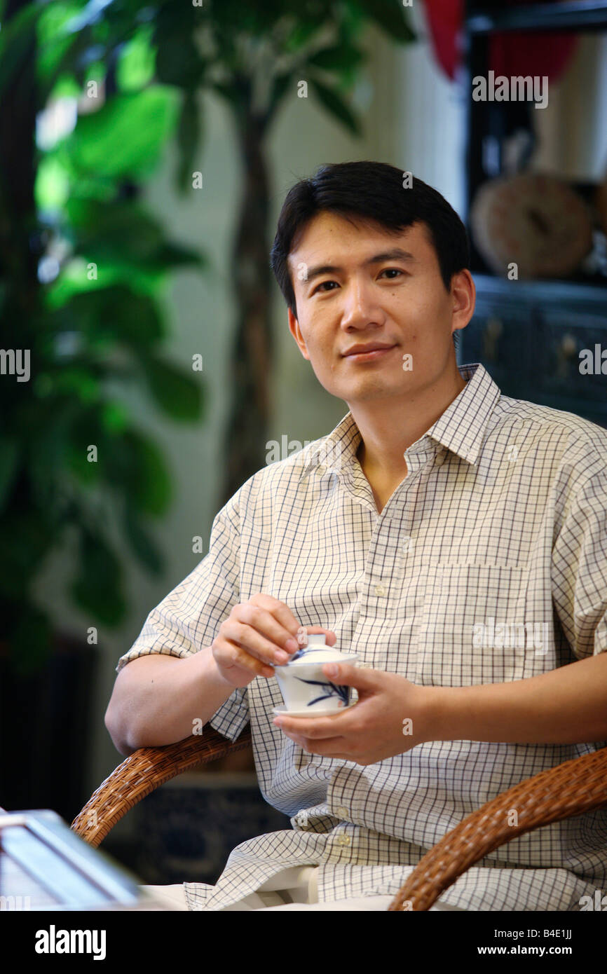 Chinese Man Drinking Tea Stock Photo - Alamy