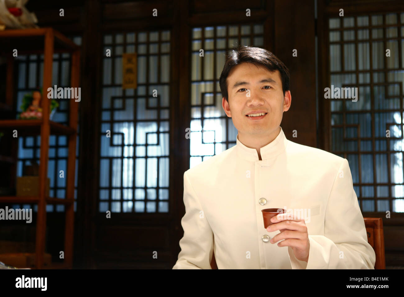 Chinese Man Drinking Tea Stock Photo - Alamy