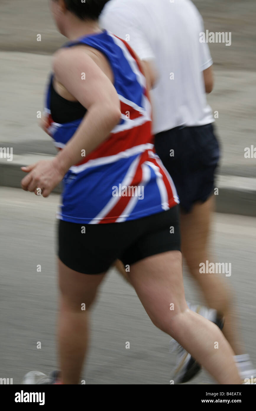 runners in action in road race Stock Photo - Alamy