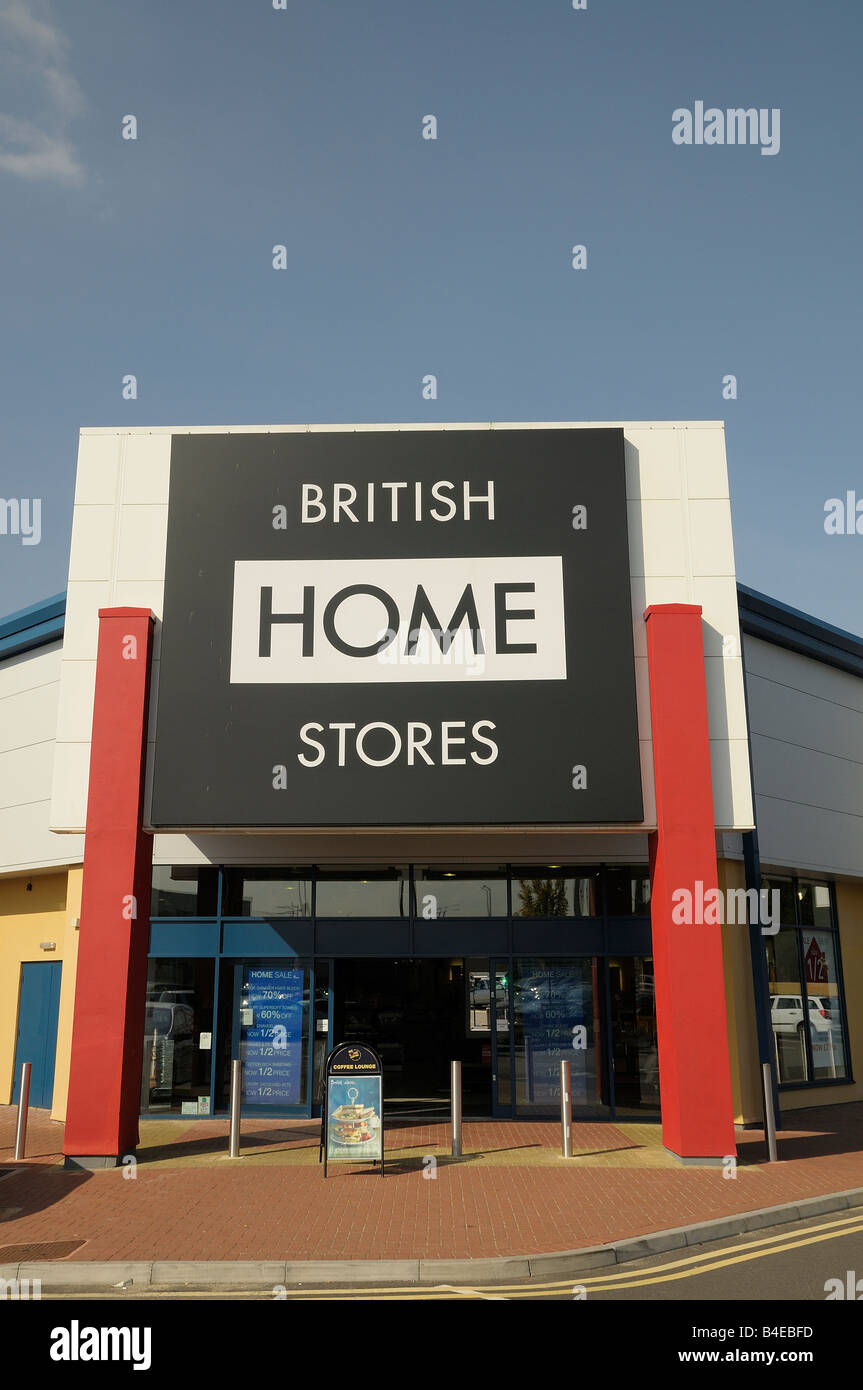 British Home Stores shop sign and frontage against a blue sky on Nene ...