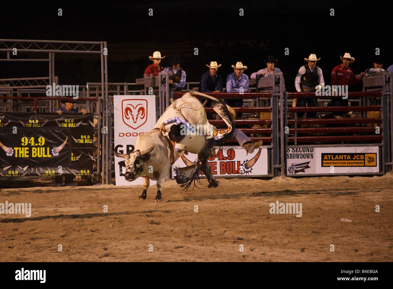 Professional Bull Rider (PBR) riding a bull. Rockdale County Fair ...