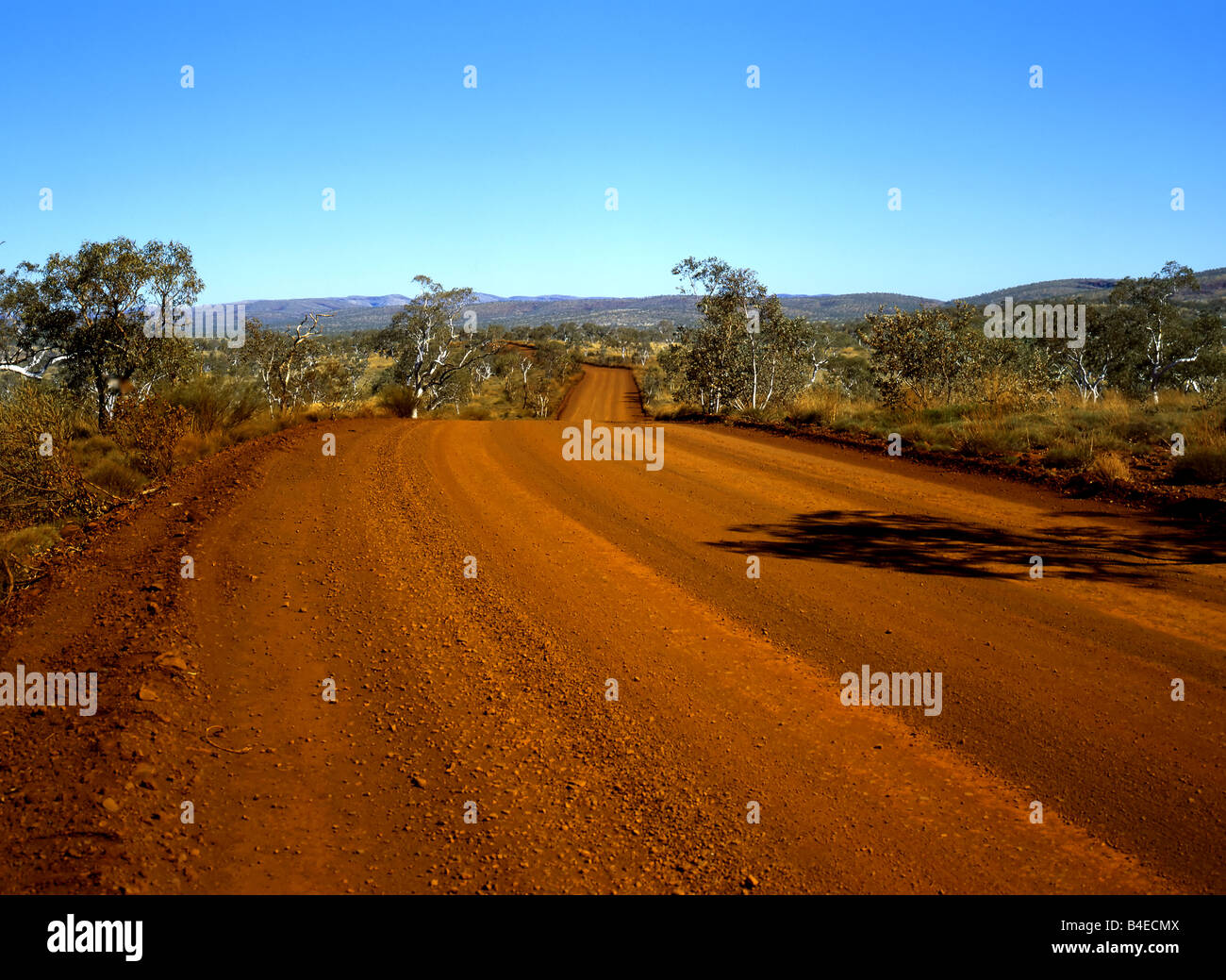 Red dirt gravel road, outback, Pilbara, Northwest Australia Stock Photo ...