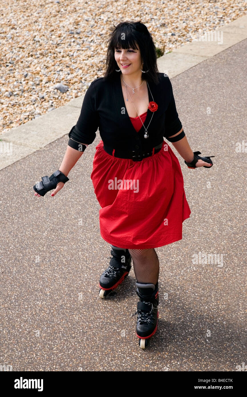 A lady on roller blades Stock Photo - Alamy