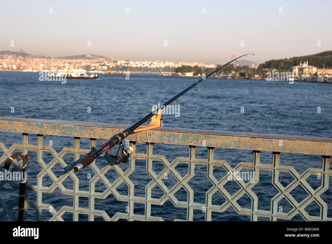Fishing Rod on Galata Bridge Istanbul Stock Photo - Alamy