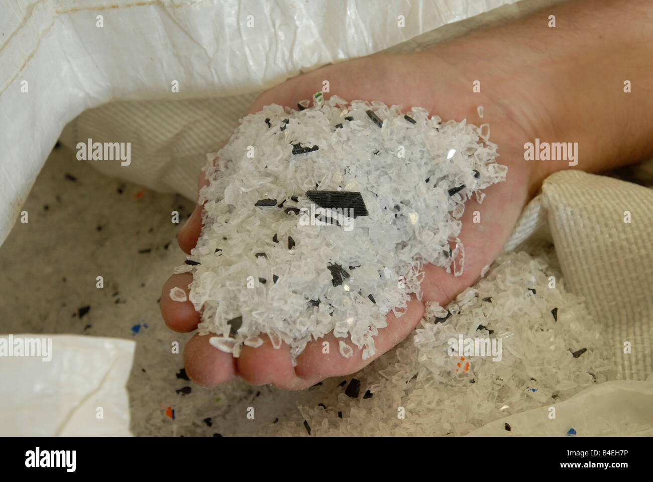 Washed flake from recycled plastic bottles awaiting reprocessing Stock ...