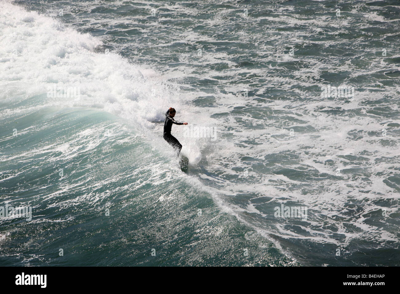 surfer riding a wave Stock Photo - Alamy