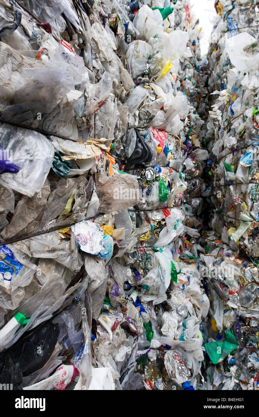 Plastics sorted and stacked in a waste recycling plant in the uk Stock ...