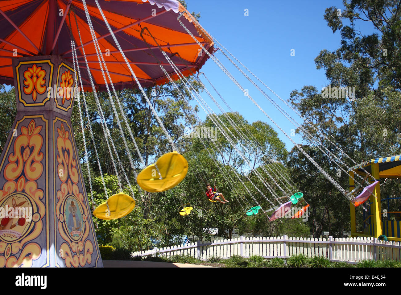 Roundabout swings hi-res stock photography and images - Alamy