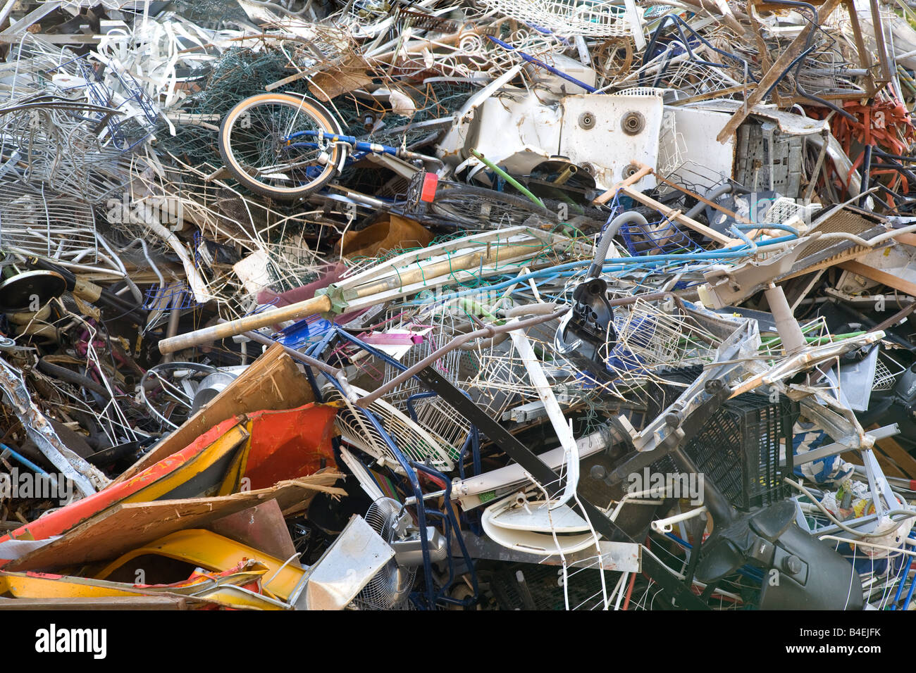 junk piled up in a scrapyard Stock Photo - Alamy