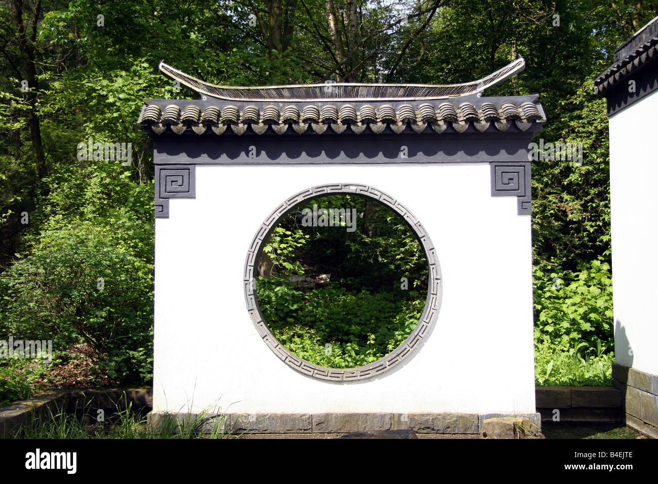wall in chinese garden with window Stock Photo - Alamy