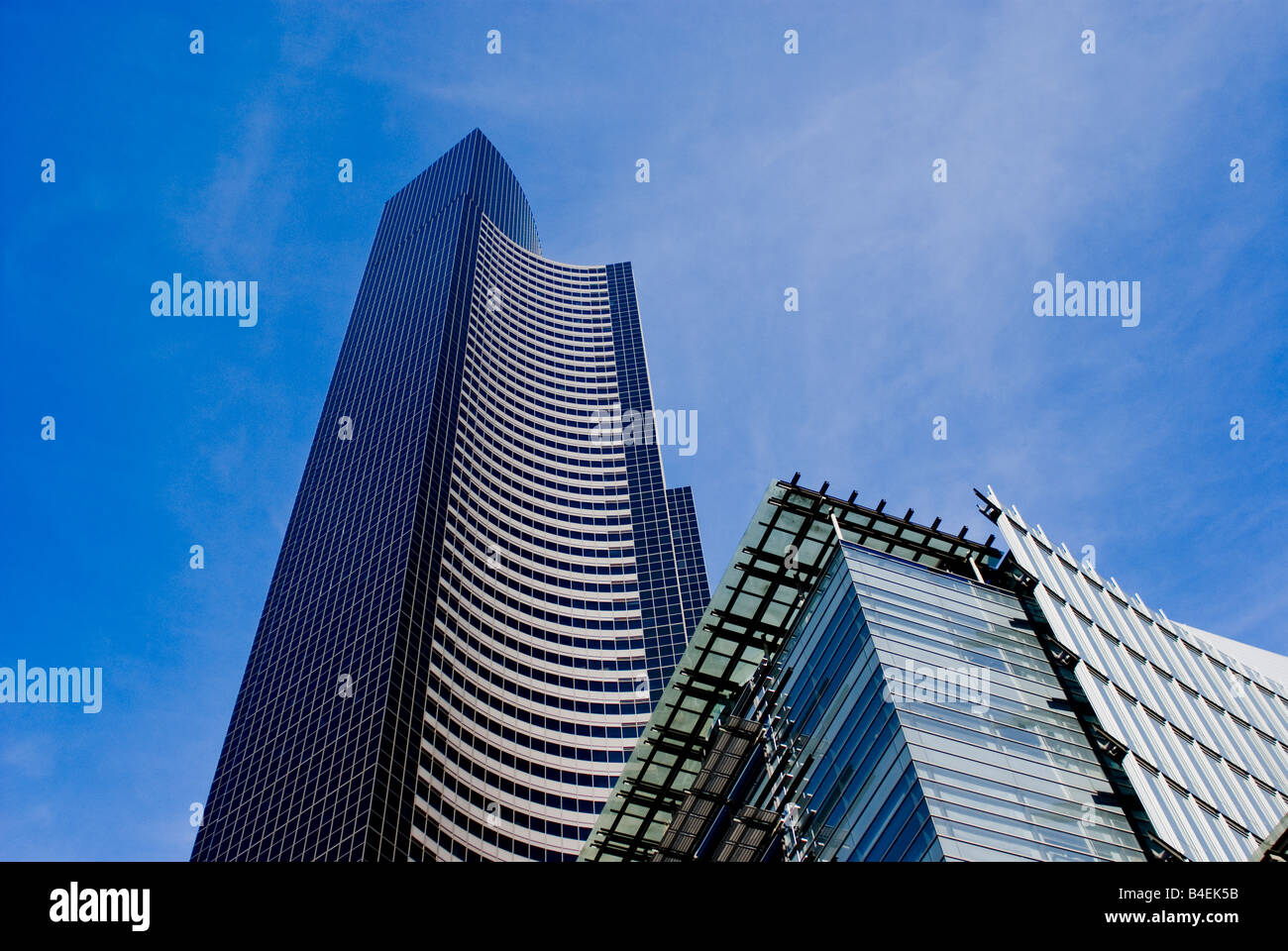 A stark example of the modern steel and glass skyscraper against a ...