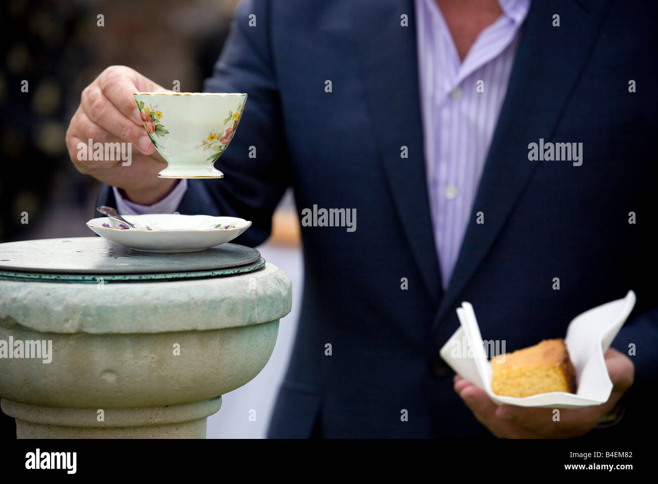 Englishman with tea and cake Stock Photo - Alamy