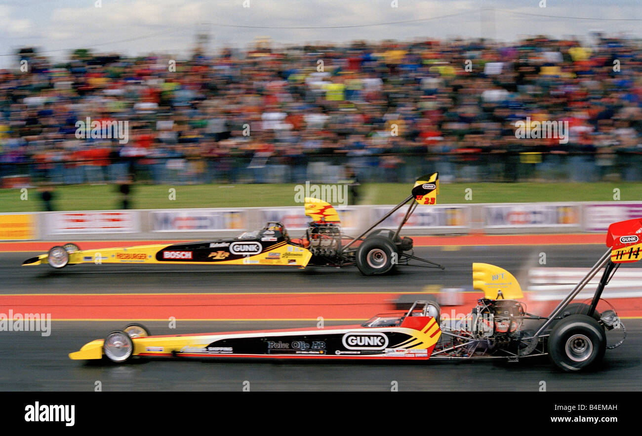 Top fuel dragsters racing at Santa Pod Raceway, Bedfordshire, England ...
