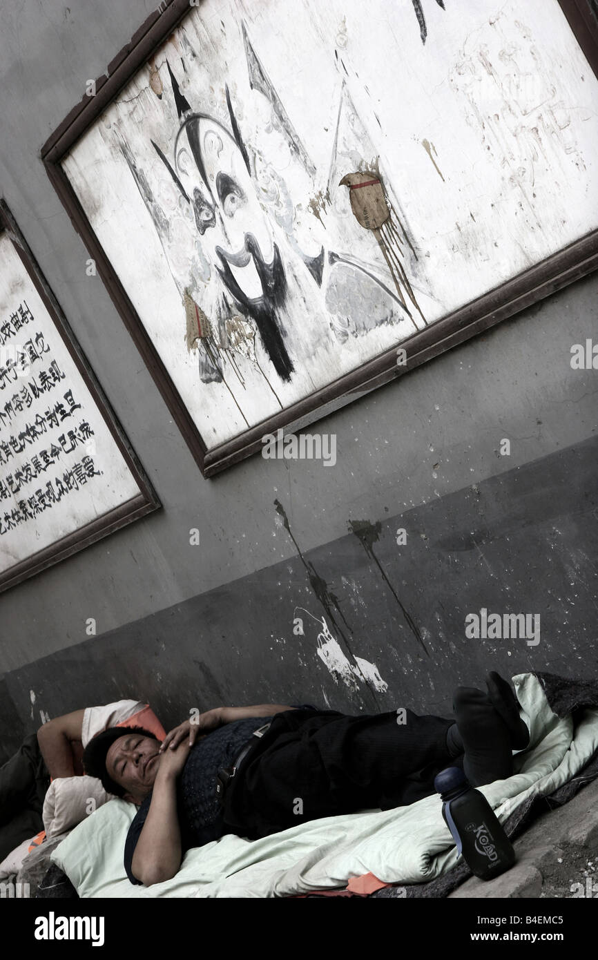 Construction workers sleeping during the day in a hutong in Beijing ...