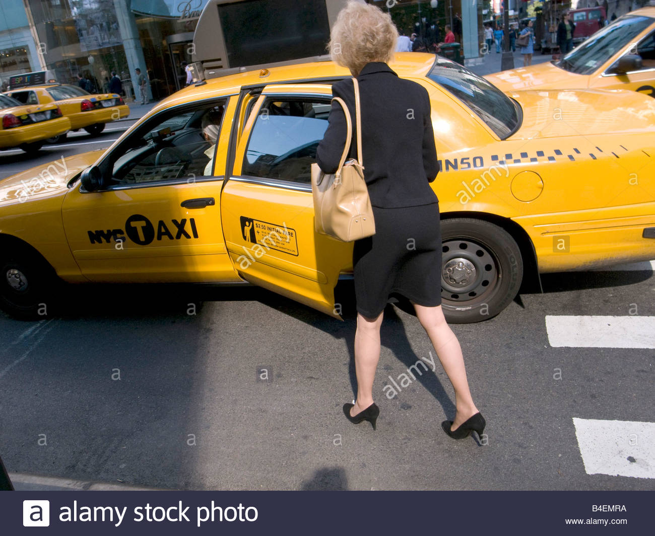 Getting On A Taxi Stock Photos & Getting On A Taxi Stock Images - Alamy
