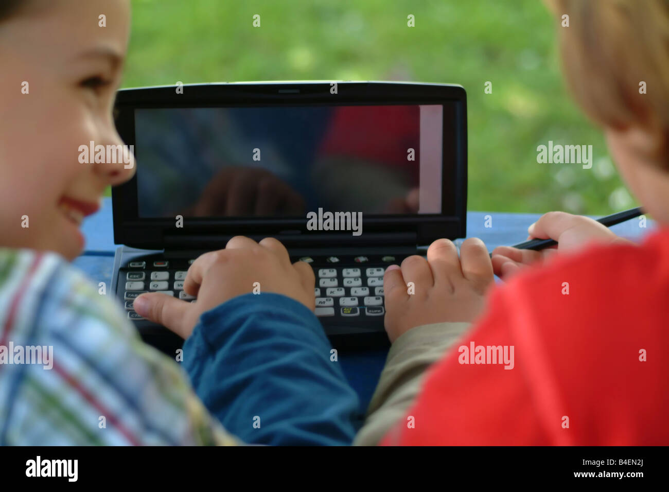 Child playing electronic keyboard hi-res stock photography and images ...