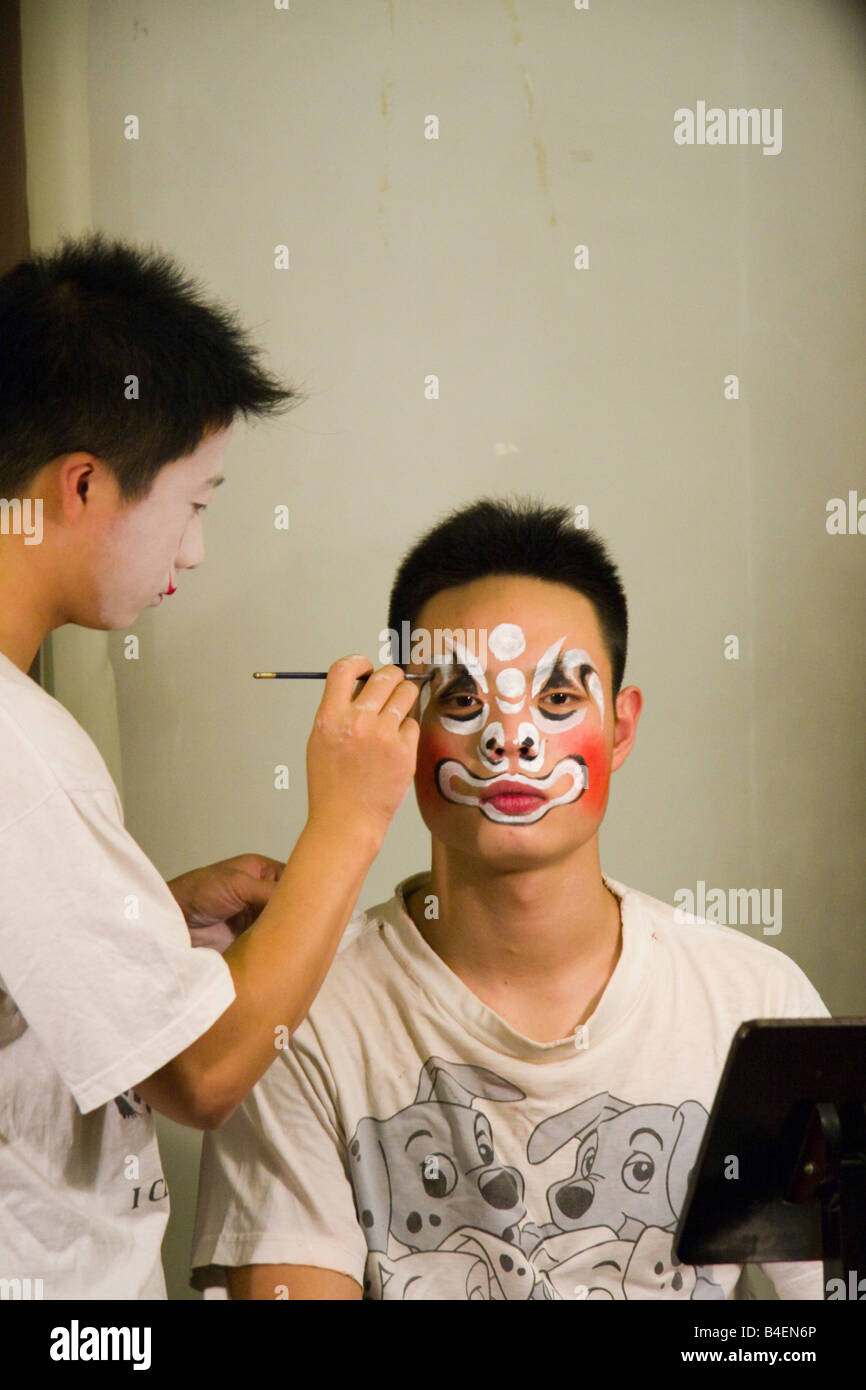 A Beijing Opera Performer applies makeup Stock Photo - Alamy
