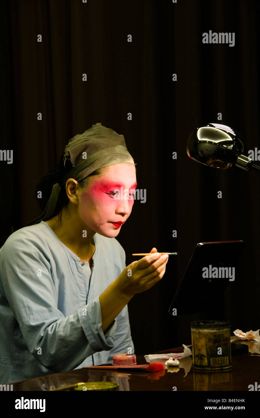 A Beijing Opera Performer applies makeup Stock Photo - Alamy
