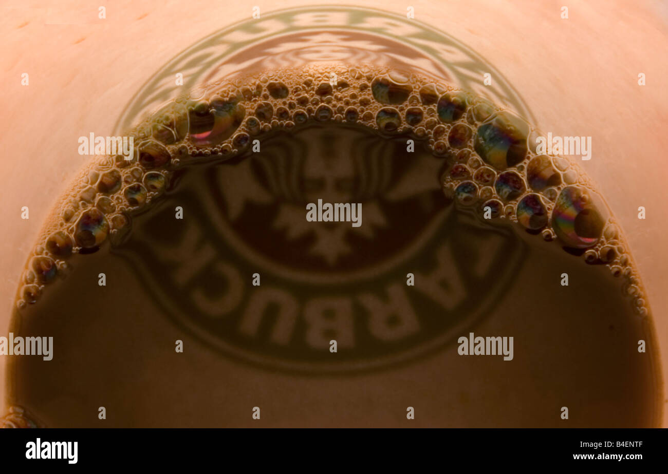 Inside view of a Starbucks coffee cup with the logo and name reflected ...