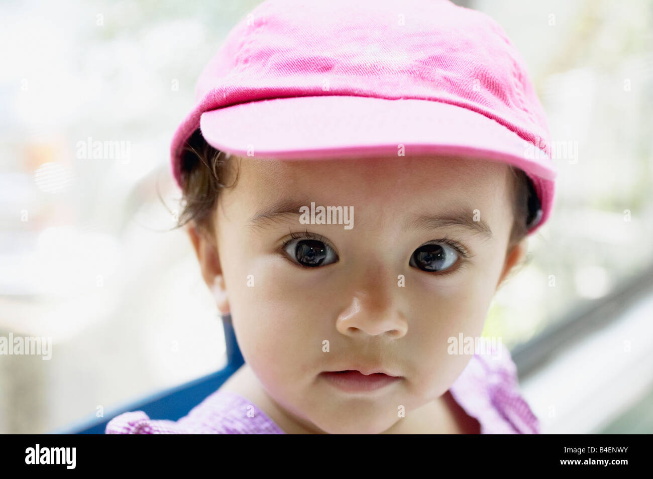 Little girl wearing cap Stock Photo - Alamy