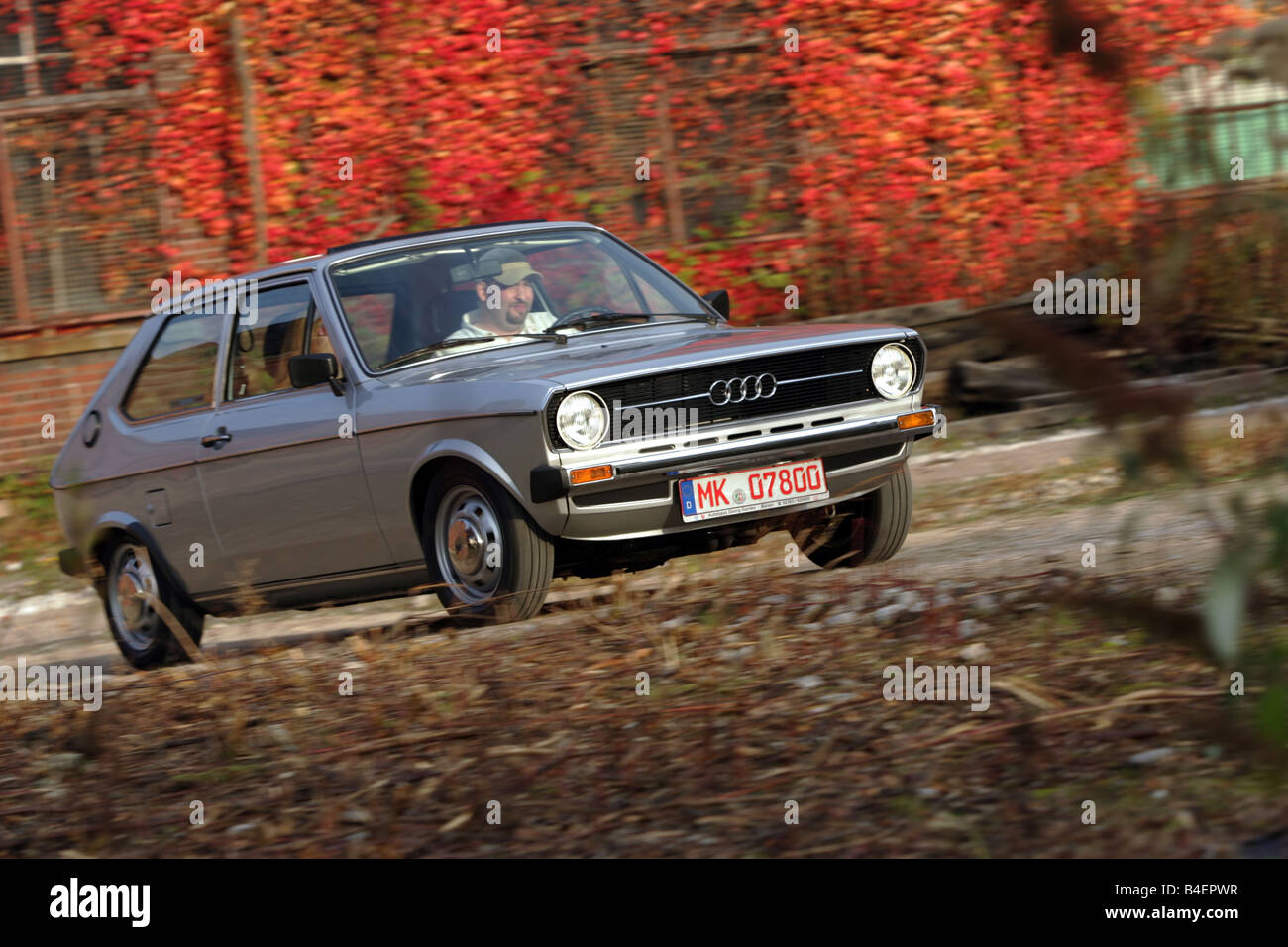 Car, Audi 50, model year 1974-1978, silver, old car, 1970s, seventies, driving, diagonal front ...