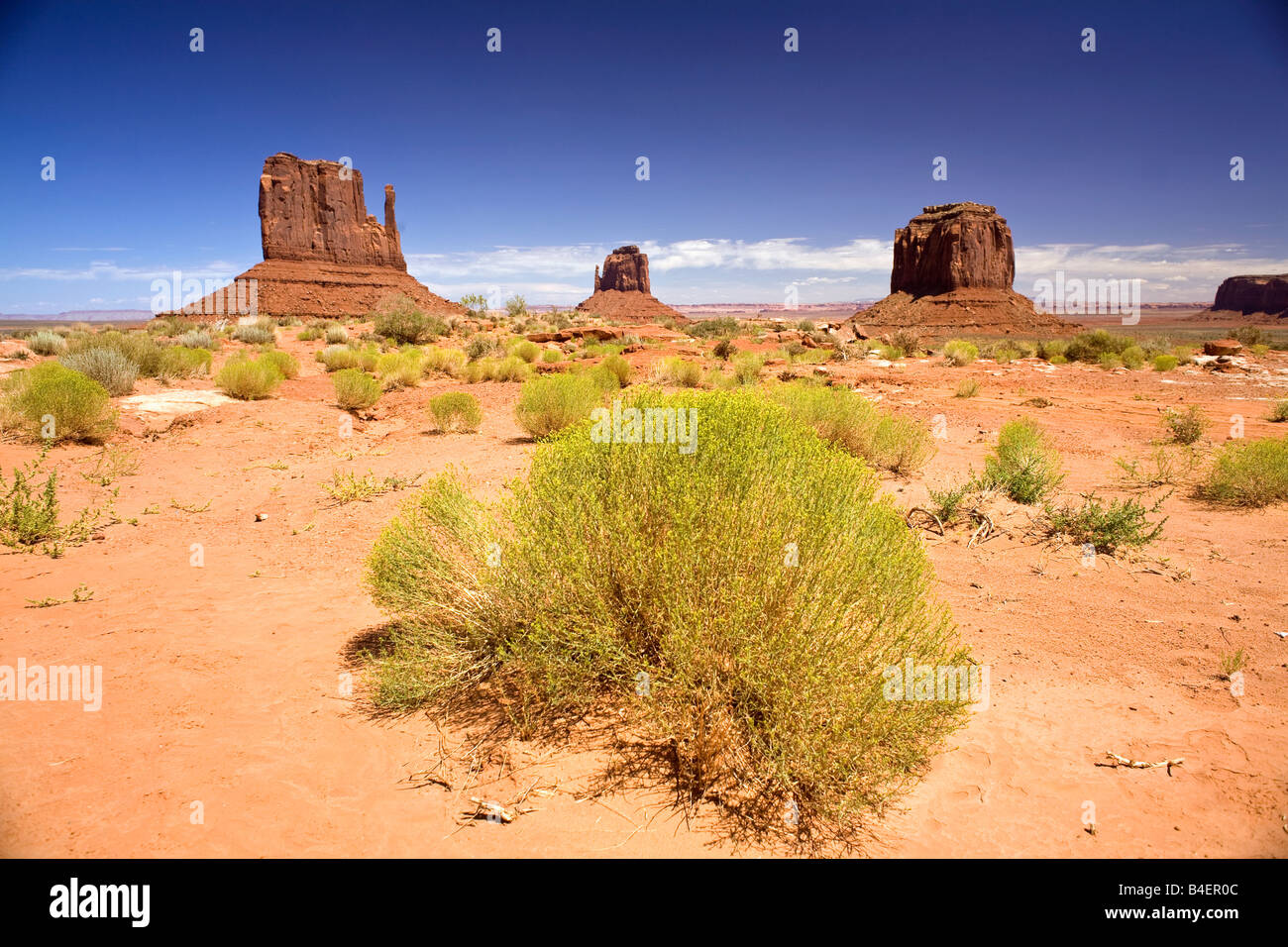 The Mittens Monument Valley Arizona USA mid day summer blue sky Stock ...