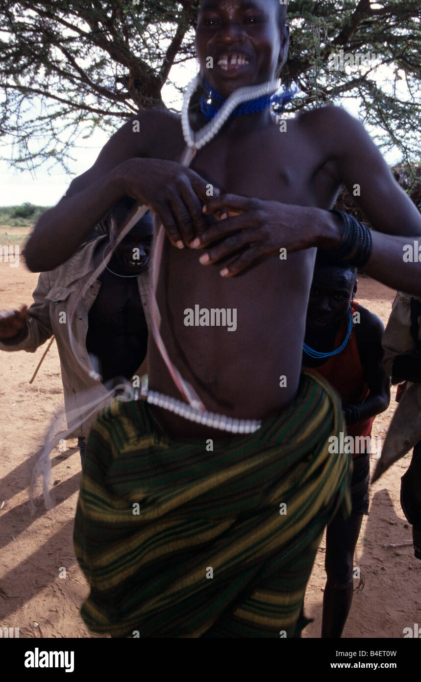 Karamojong villagers jumping in dance, Karamoja, Uganda Stock Photo - Alamy