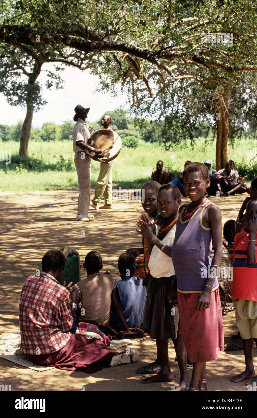Ethnic Karamojong villagers watching demonstration, Karamoja, Uganda Stock Photo - Alamy