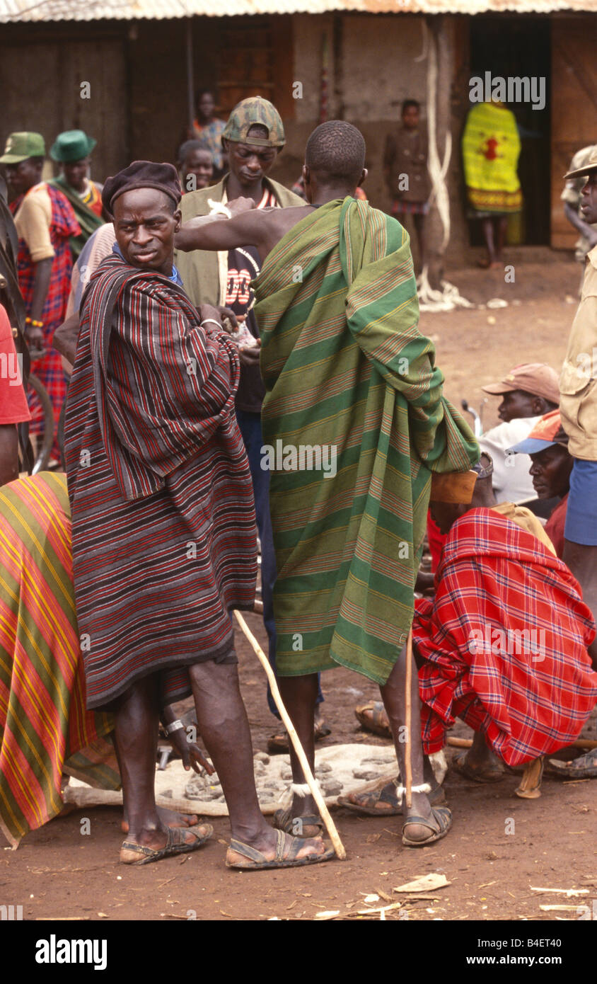Karamojong villagers in discussion, Karamoja, Uganda Stock Photo - Alamy