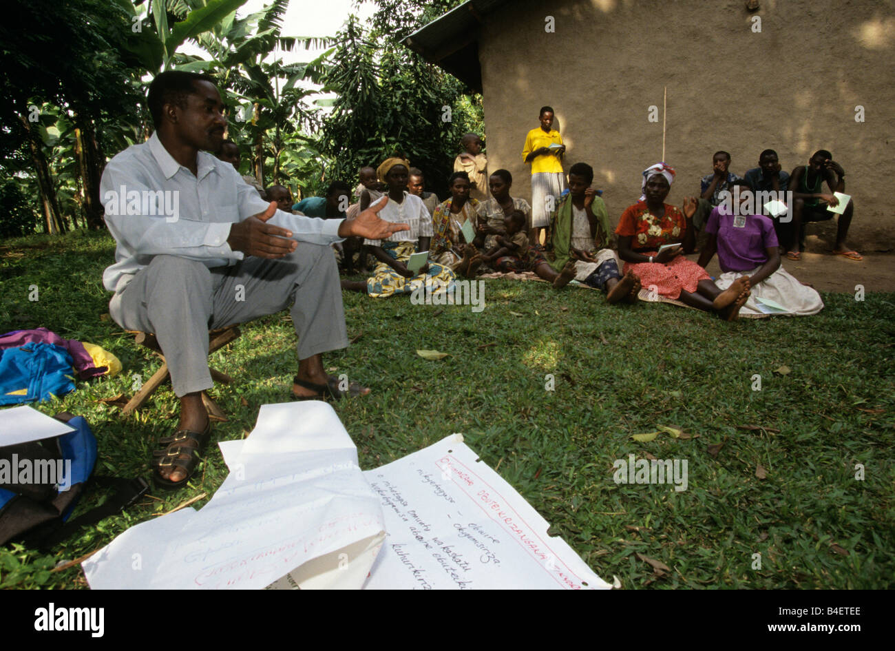 Villagers listening to officer on community empowerment project in ...