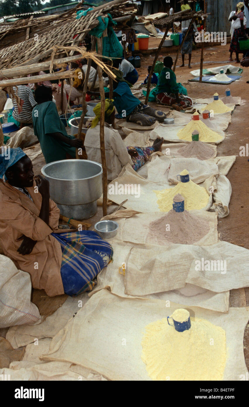 Market scene with stall keepers with heaps of spices displayed on ...