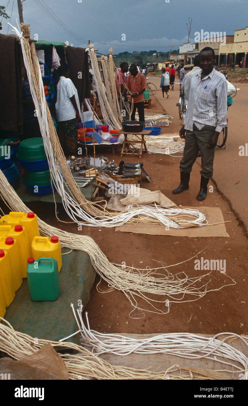 Market scene with stalls selling rope and twine. Uganda Stock Photo - Alamy