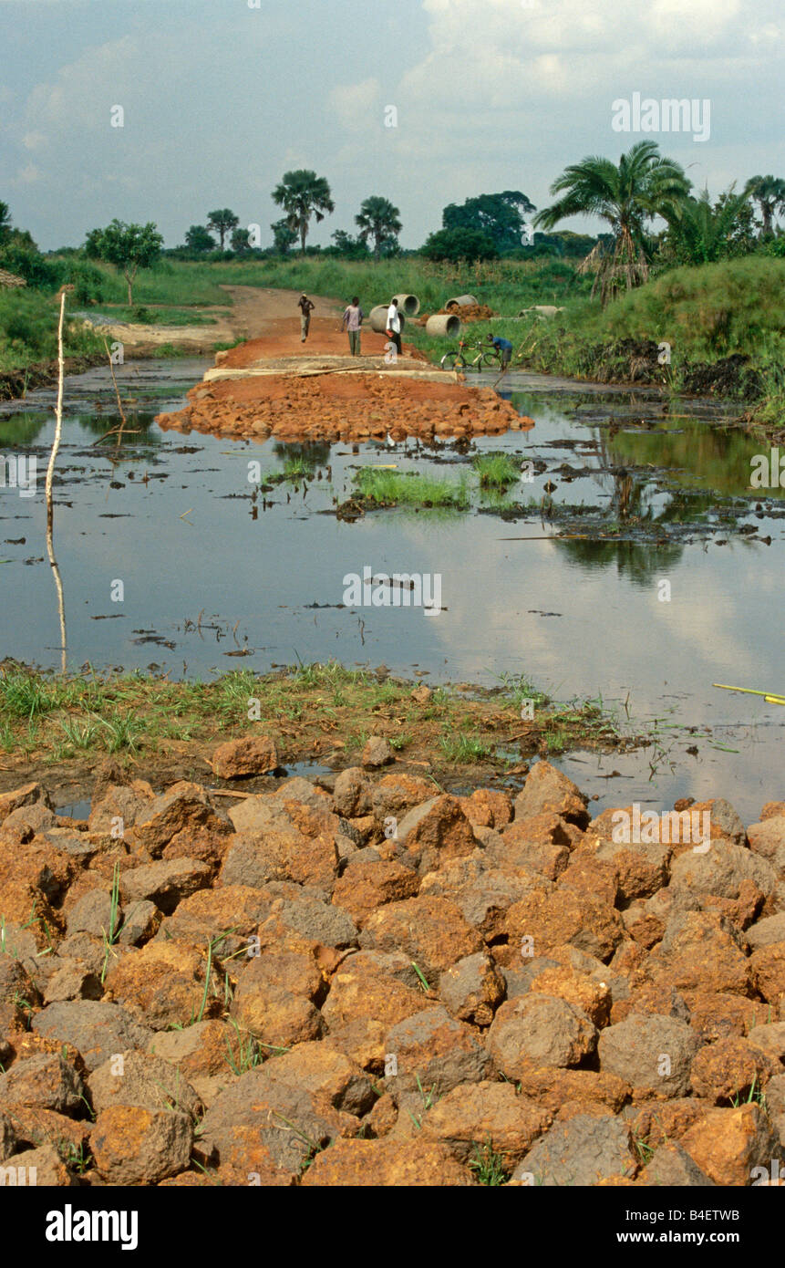 Road construction over water. Uganda Stock Photo - Alamy