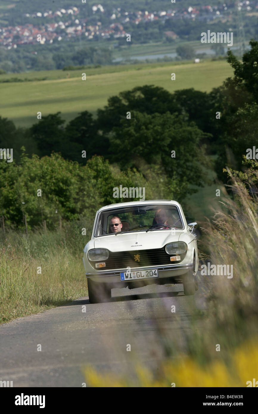 Peugeot 204, vintage car, model year 1965, driving, diagonal front ...