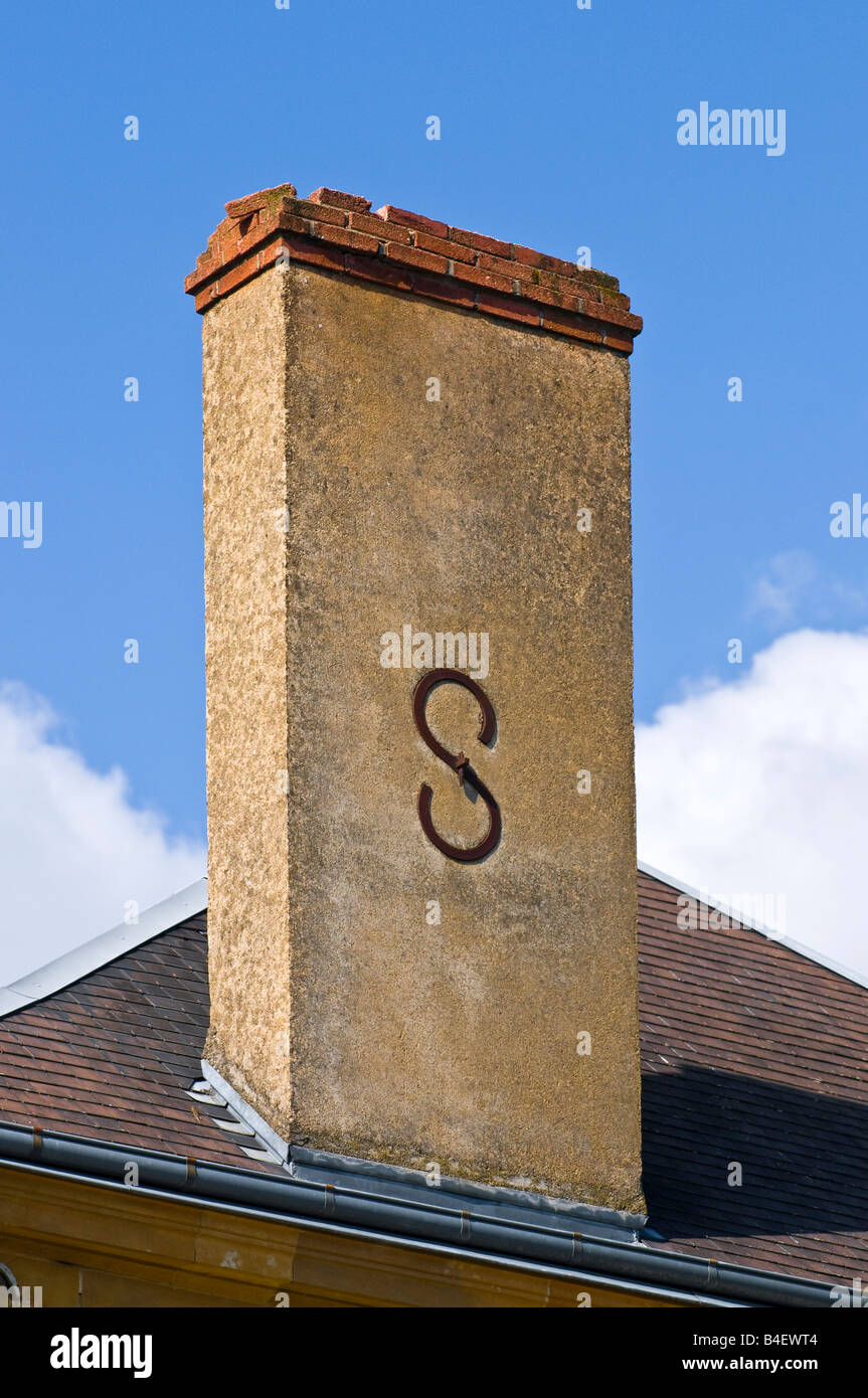 Decorative letter reinforcing chimney stack hi-res stock photography ...