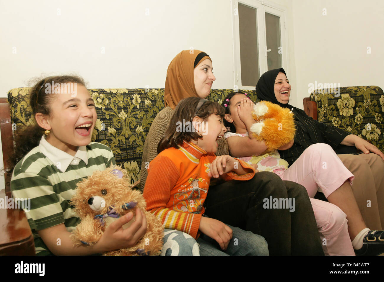 An Iraqi refugee family at home in Cairo, Egypt Stock Photo - Alamy