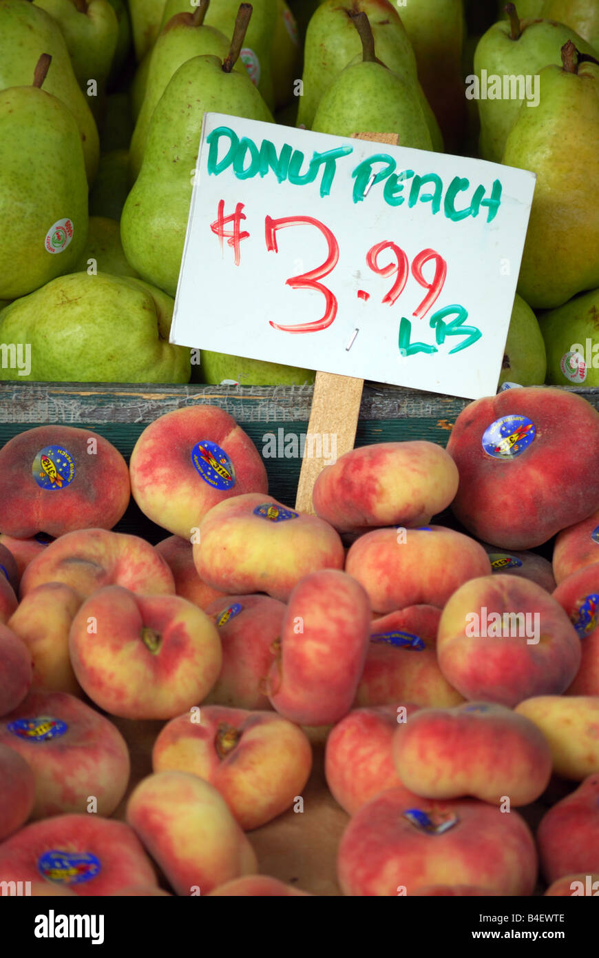 Pears and peaches for sale at a fruit stand at Seattle's Pike Place ...