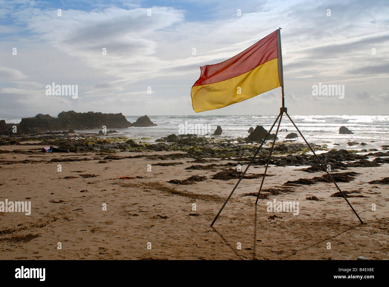 RNLI Lifeguard Flag on a Beach in Cornwall Stock Photo - Alamy